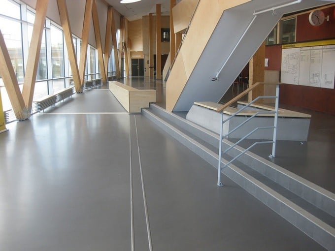 Underlayment and decorative floor in university building